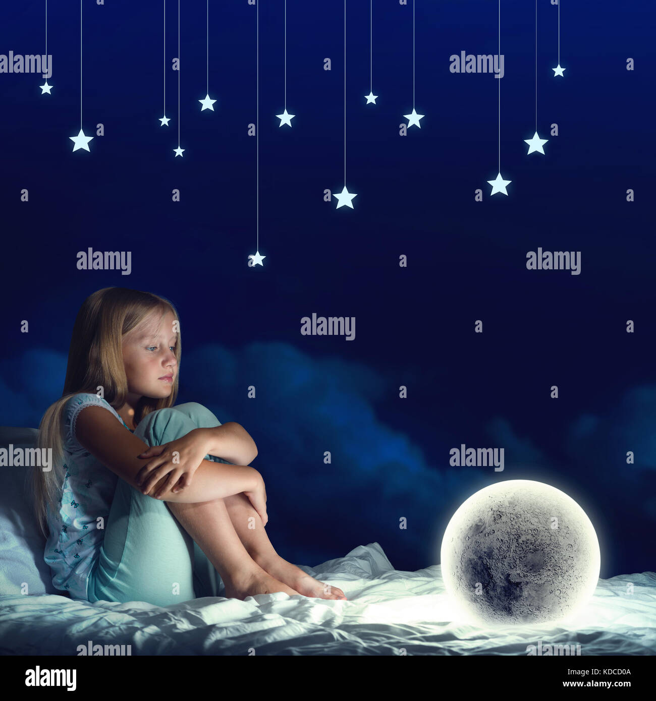 Girl in her bed and moon planet Stock Photo - Alamy