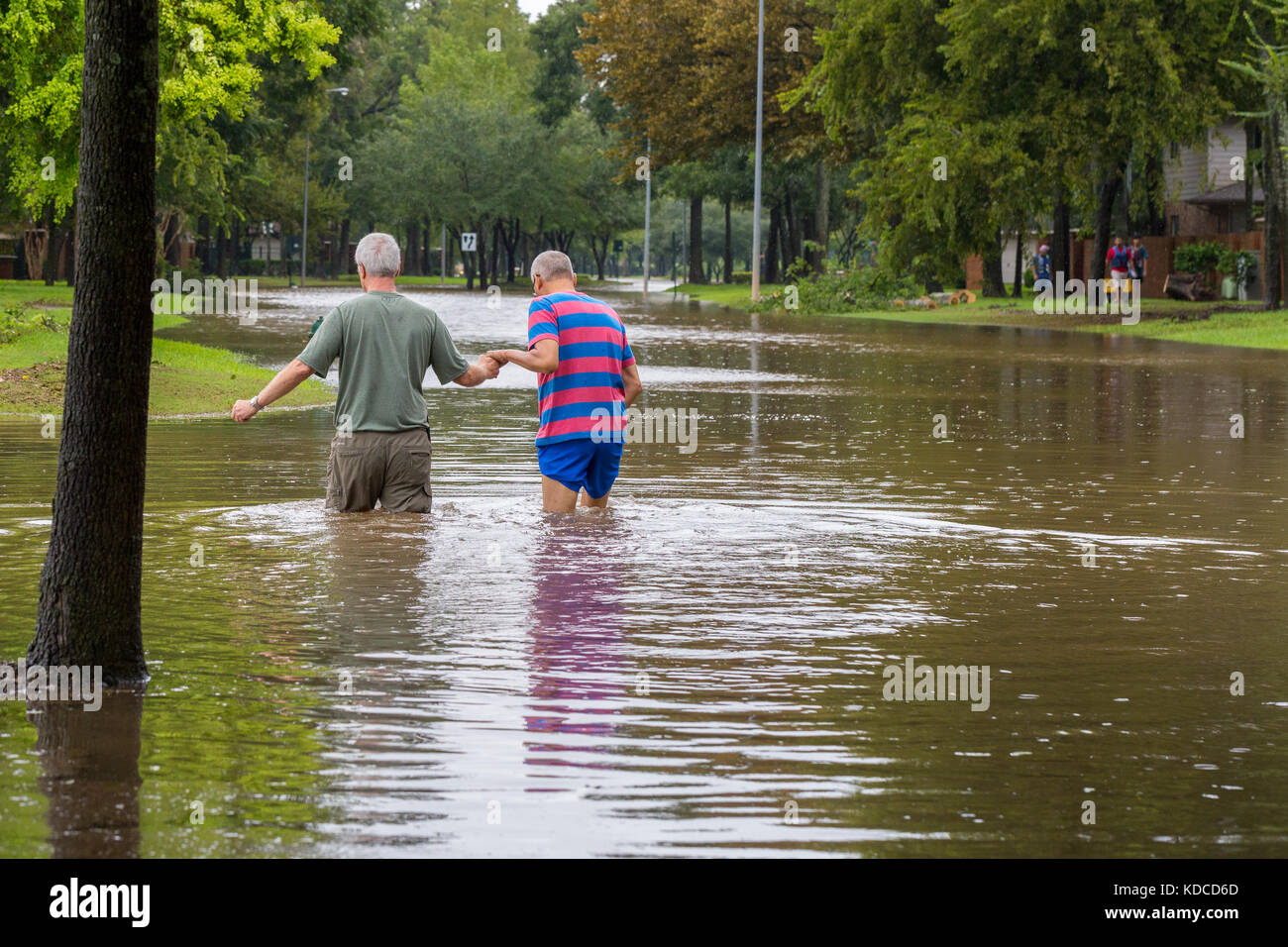 Houston area residents navigate high waters. Heavy rains from hurricane ...