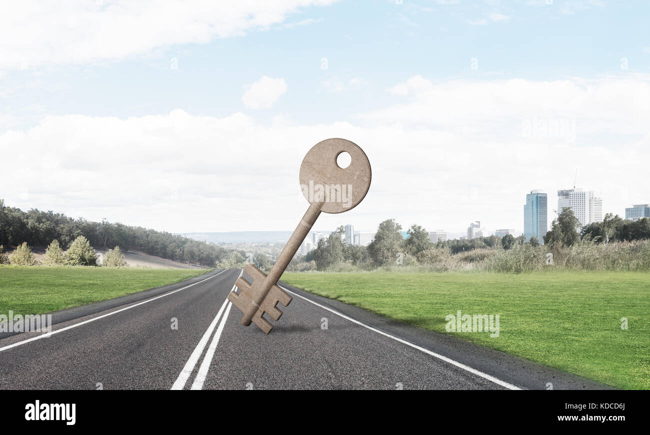Conceptual background image of concrete key sign on asphalt road Stock ...