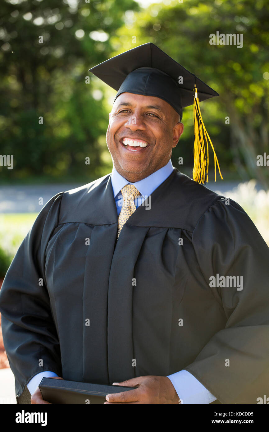 Middle age man going back to school. Graduation Stock Photo - Alamy