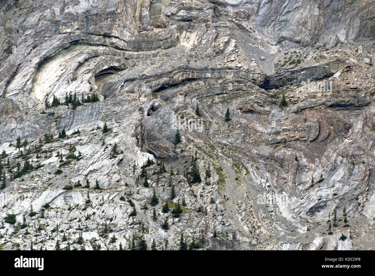 Interesting formations on the side of a mountain give a gnarled ...