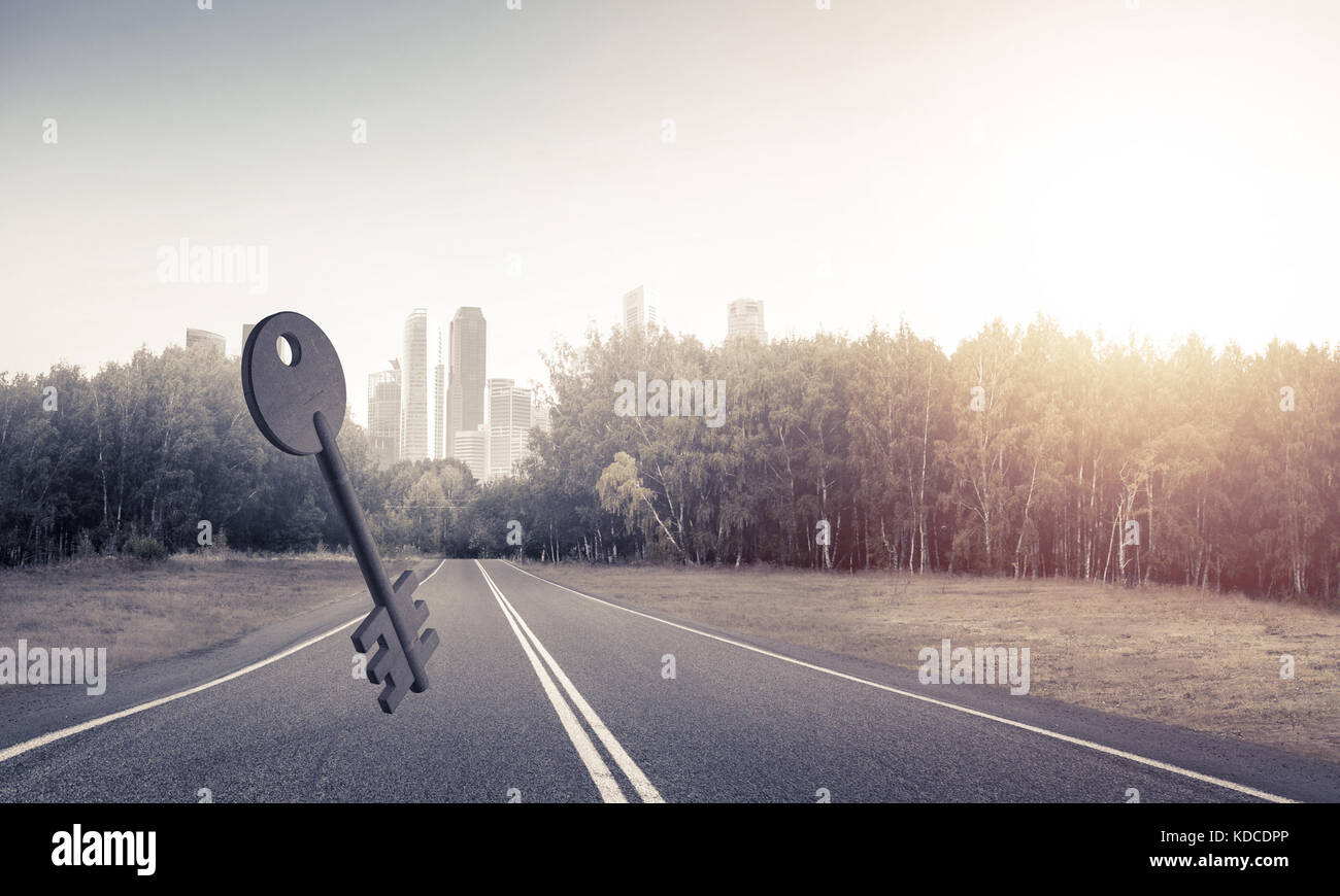 Conceptual background image of concrete key sign on asphalt road Stock ...