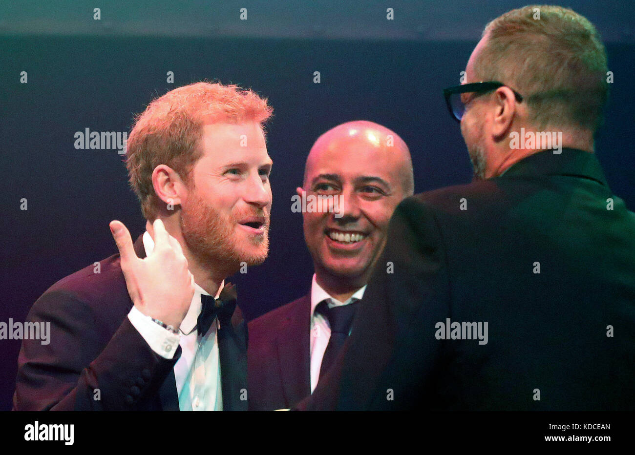 Prince Harry (left) receives a posthumous Legacy award on behalf of his ...