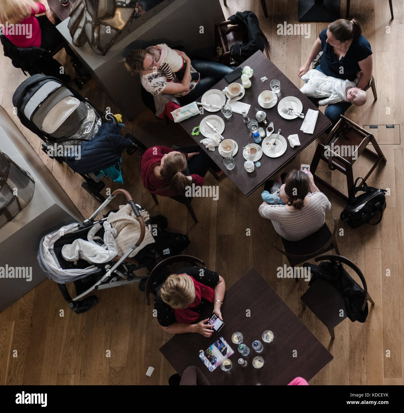 Restaurant baby pram table hi-res stock photography and images - Alamy
