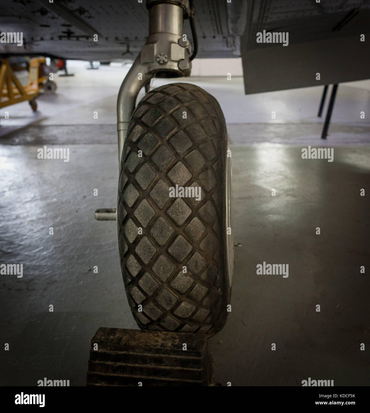 Old airplane landing gear wheel closeup Stock Photo - Alamy