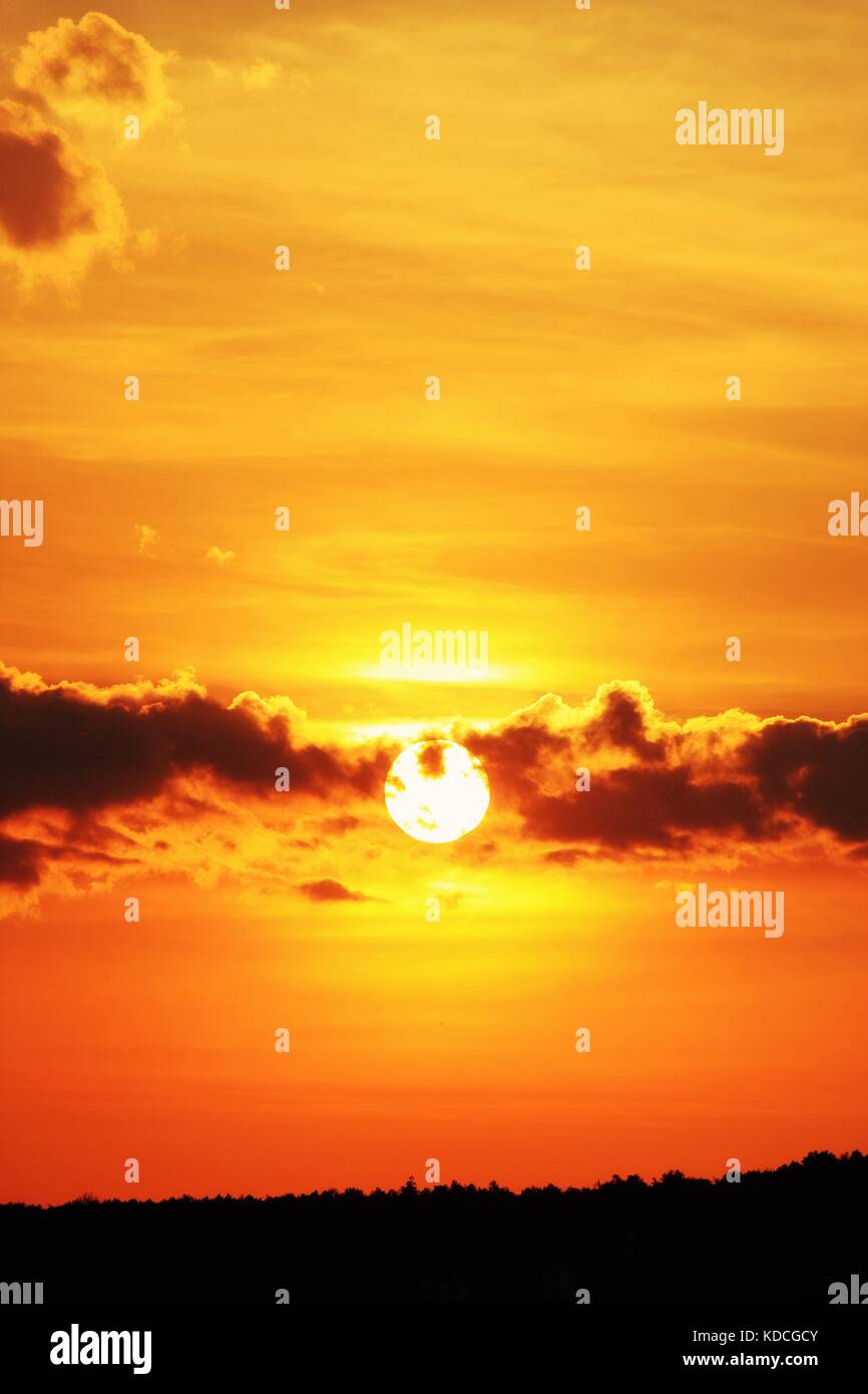 Beautiful sunset time with golden sun Stock Photo - Alamy