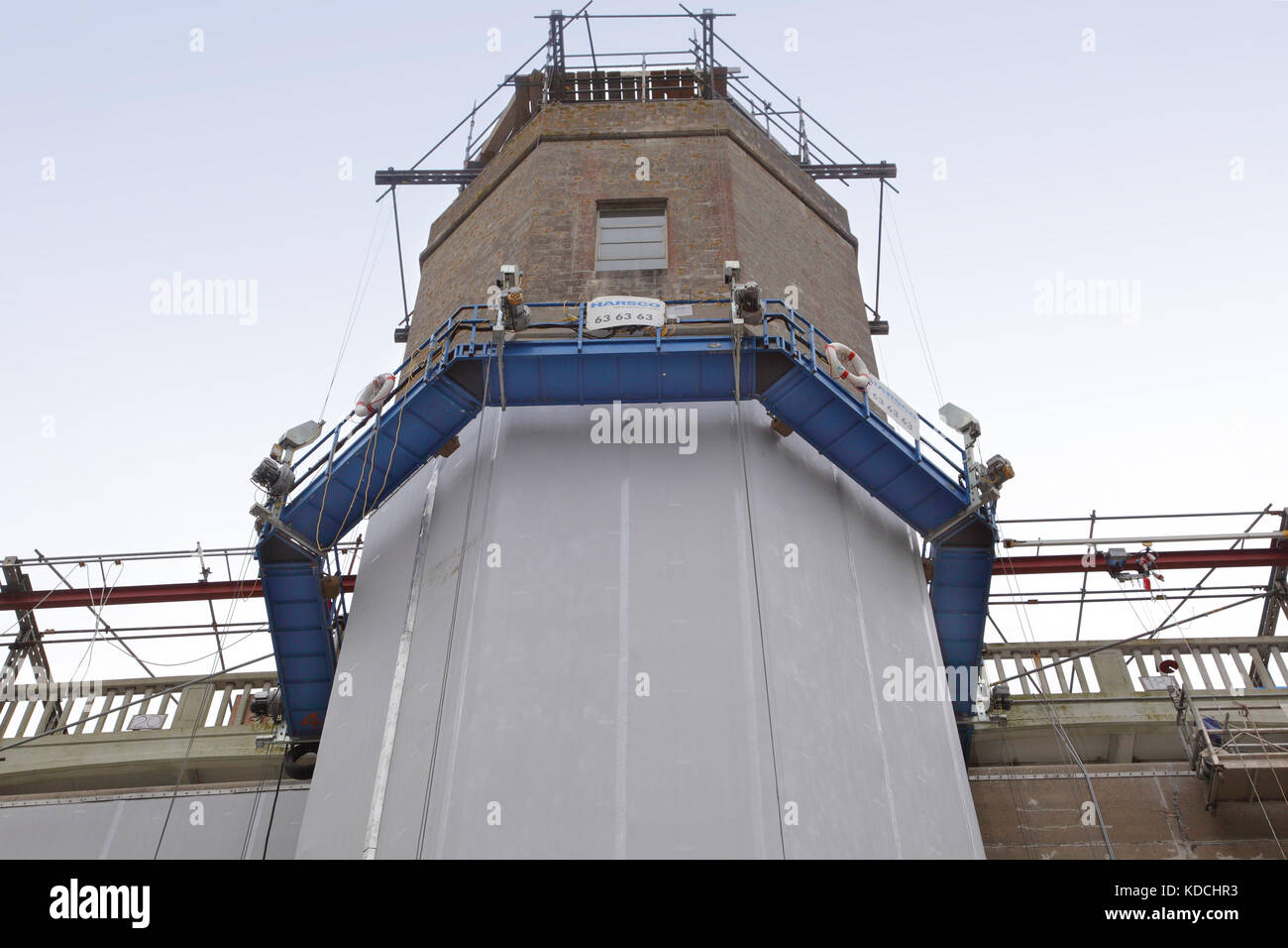 A special suspended access gantry being used to apply a waterproof ...