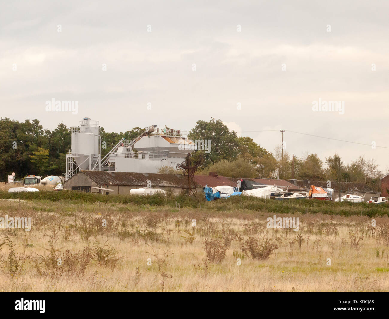 quarry industry factory building field in front boats; essex; england ...