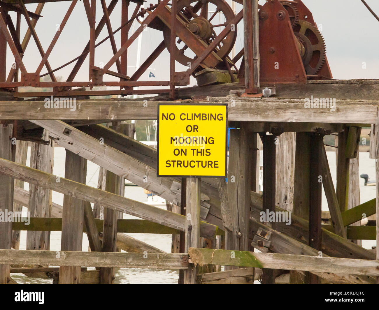 close up of yellow safety sign no climbing or mooring; essex; england ...
