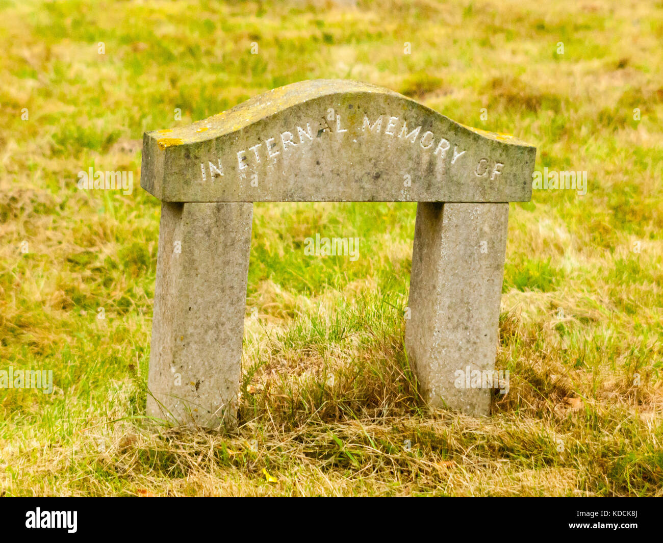 small stone arch grave stone with text in eternal memory of; essex ...