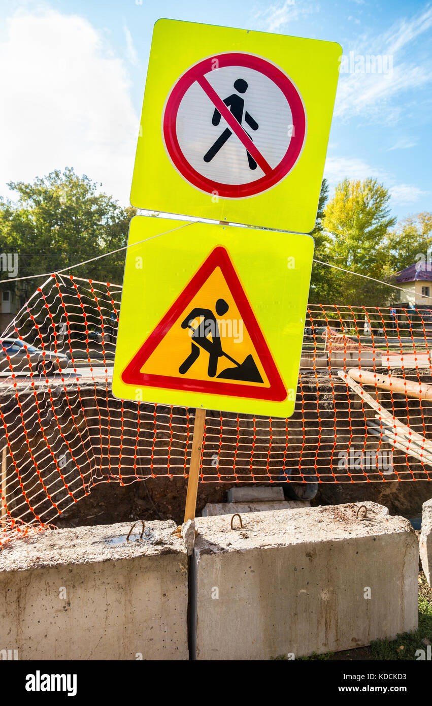 Road signs at the construction site in summer day Stock Photo - Alamy