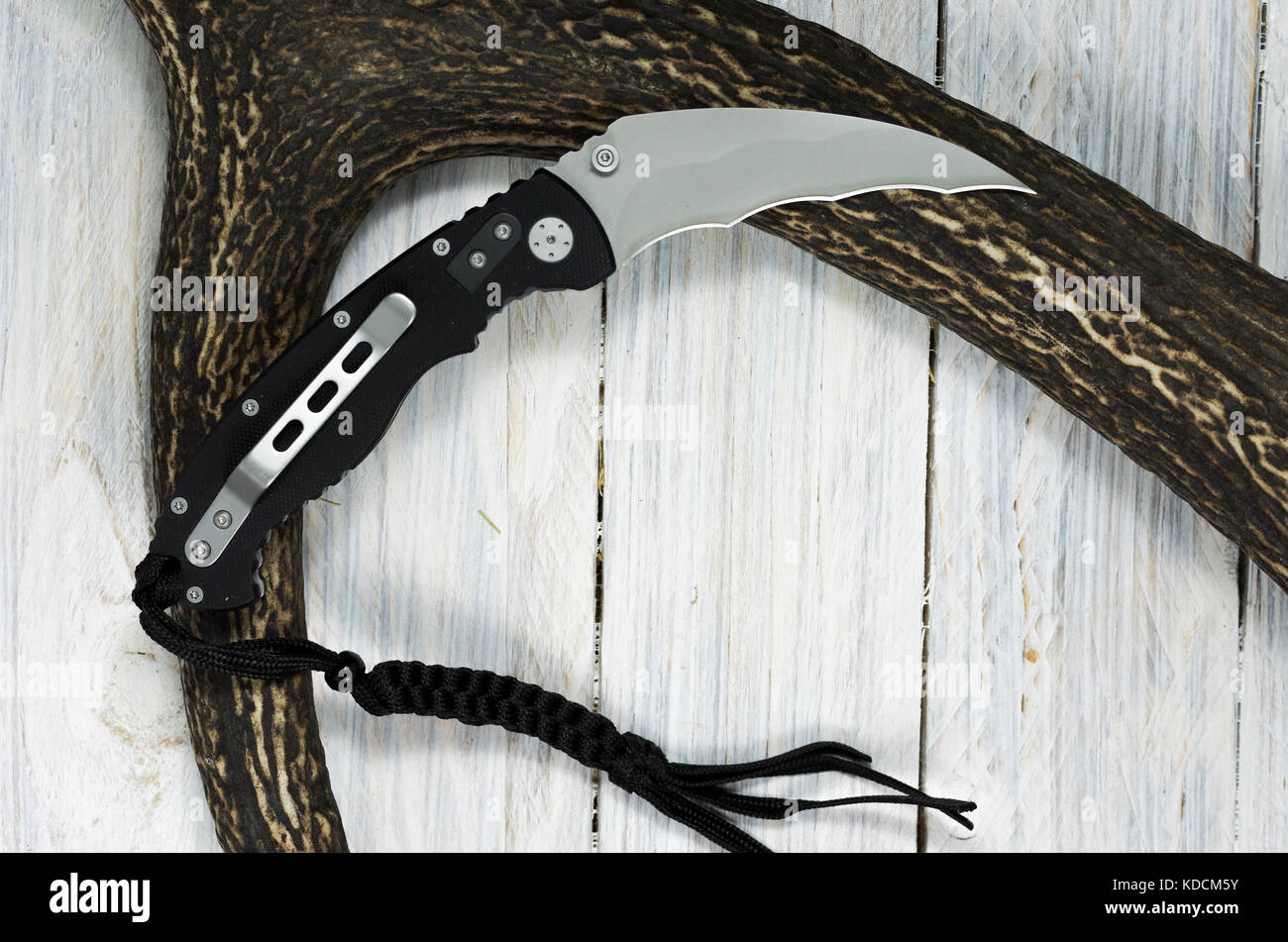 Knife with a unique semicircular blade. Oval blade. The horn of a deer ...