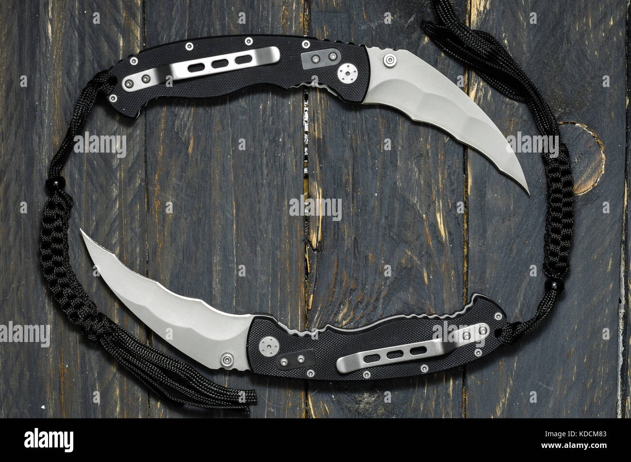 A combination of knives. Knives in the form of a circle. Black ...