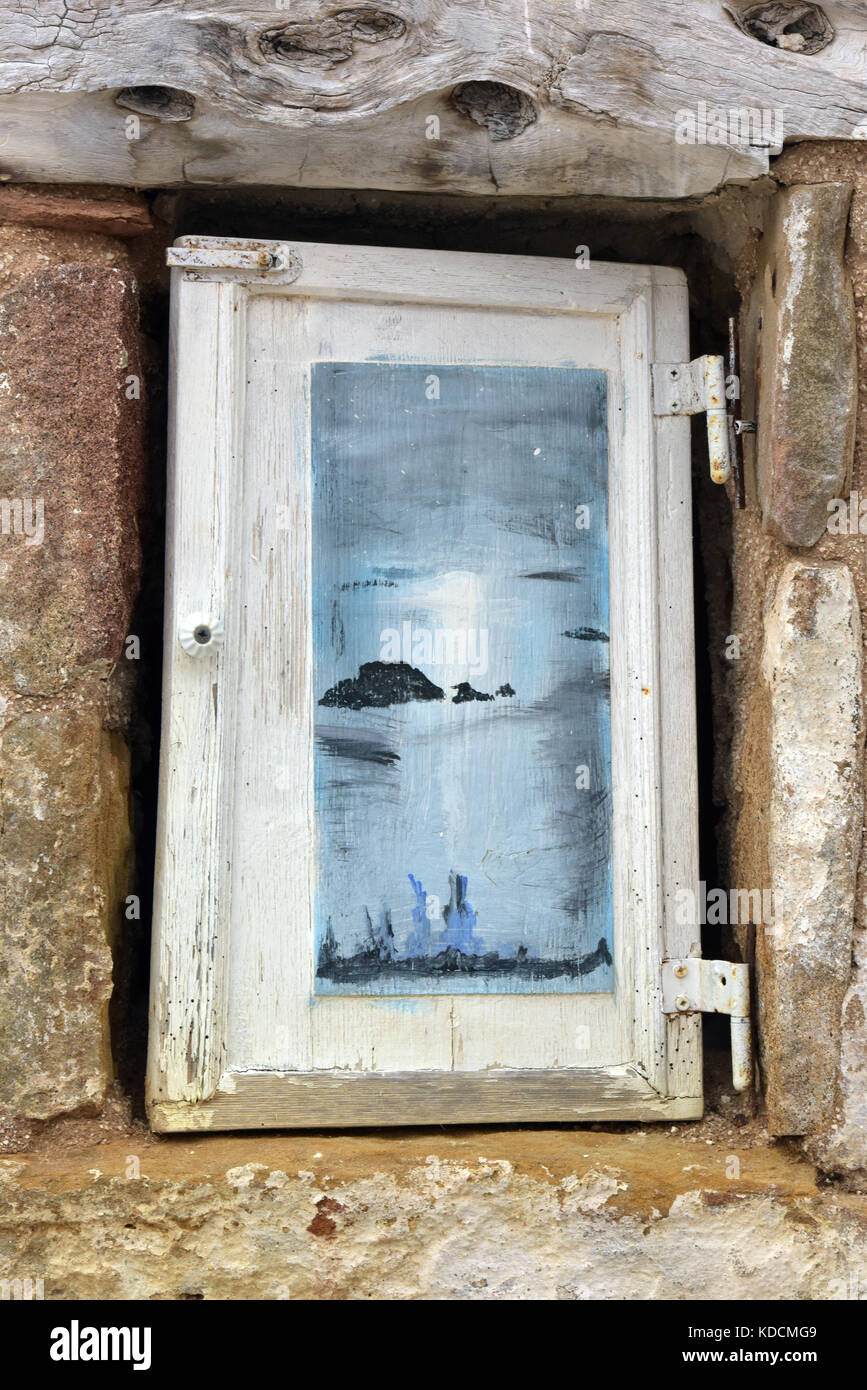 a distressed window frame with peeling paintwork in the shabby chic ...