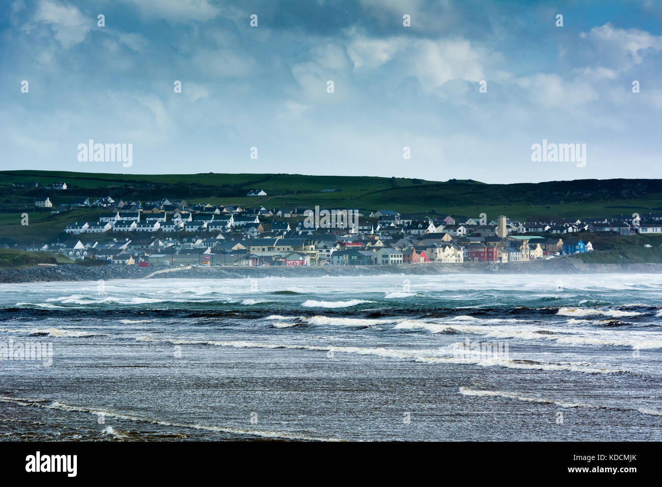 View of the colourful town of Lahinch across Liscannor Bay along the ...