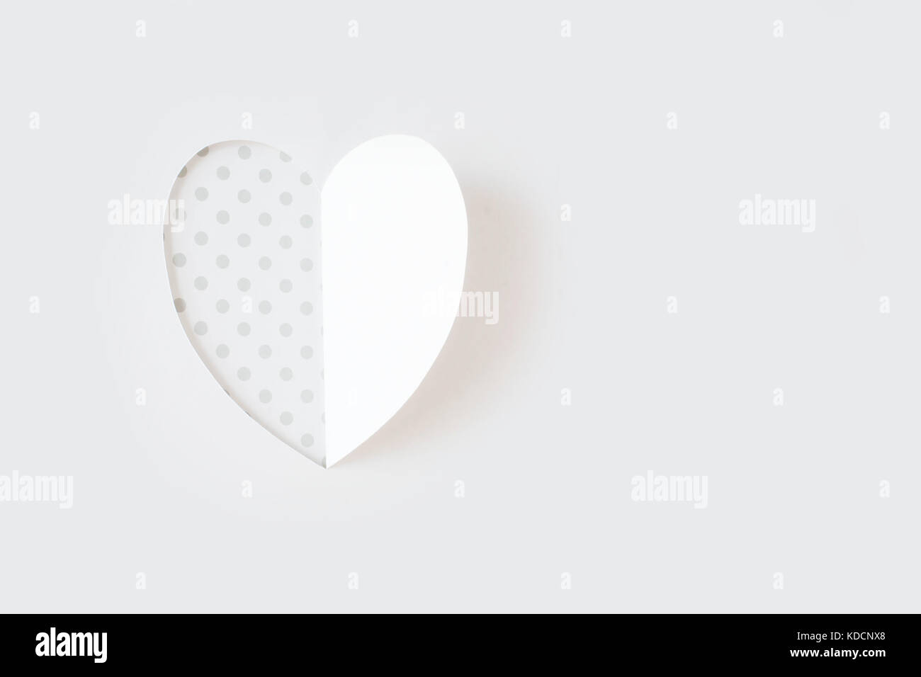 Paper heart cut from paper Stock Photo - Alamy