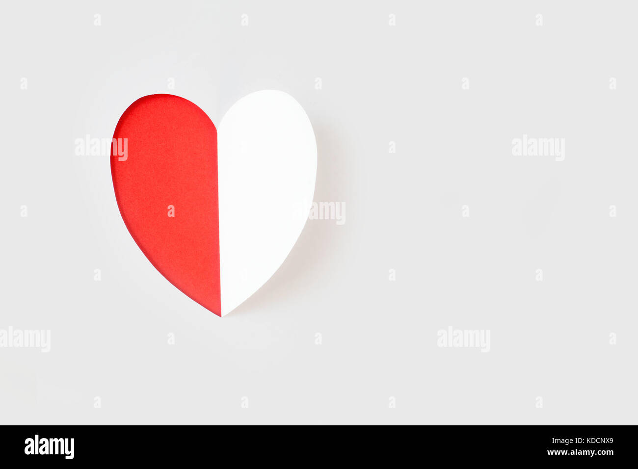 Paper heart cut from paper Stock Photo - Alamy