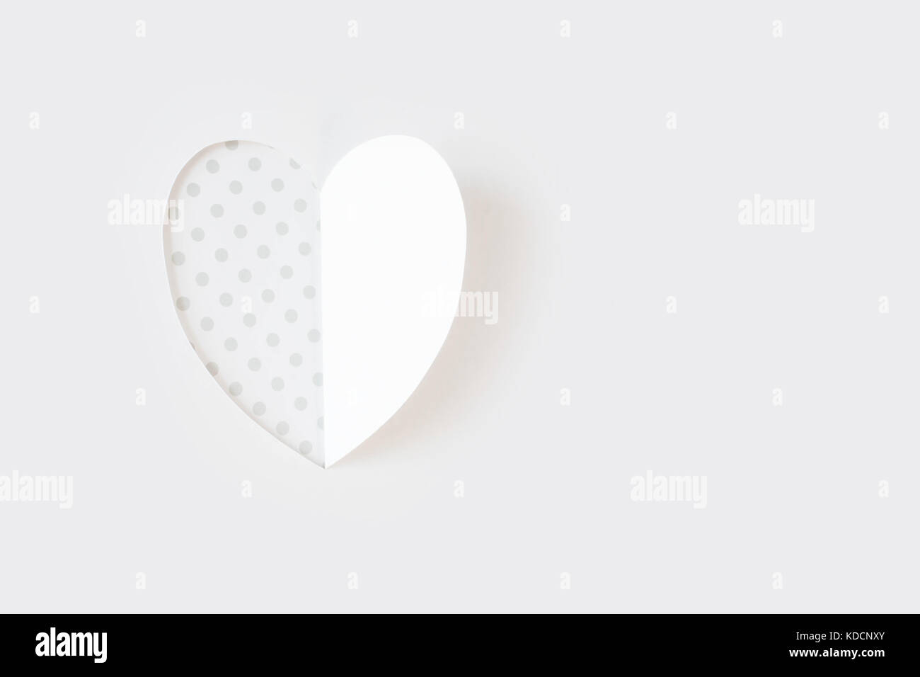 Paper heart cut from paper Stock Photo - Alamy