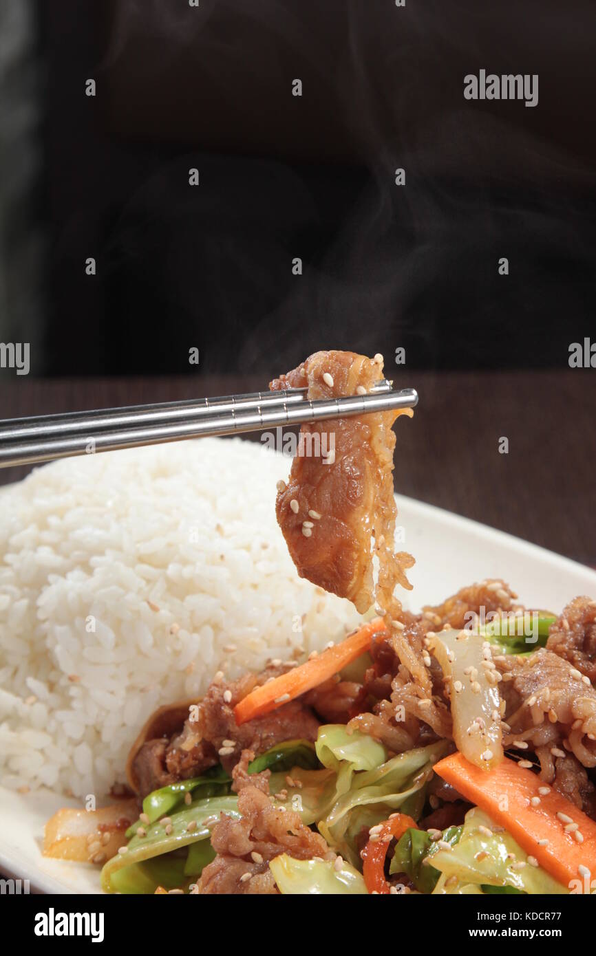 rice with pork or other meat Stock Photo - Alamy