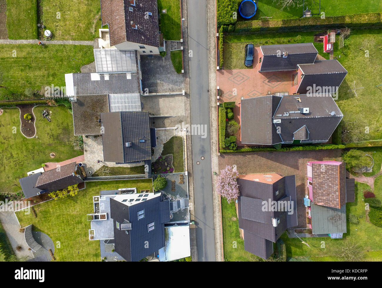 Aerial photo with the drone, a new build-up plot with single houses and ...
