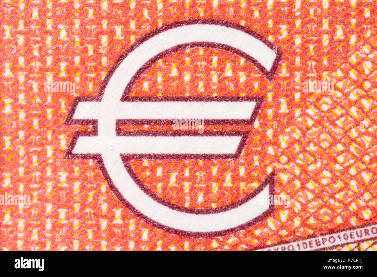Euro symbol on red background Stock Photo - Alamy