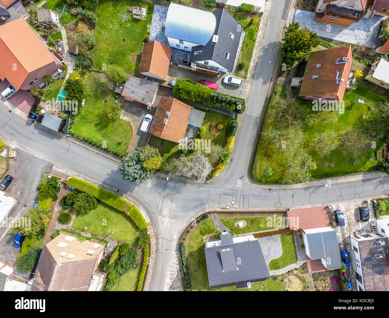 Aerial photo with the drone, a new build-up plot with single houses and ...