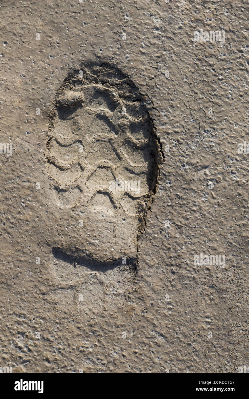 Footstep pattern seen on a concrete background Stock Photo - Alamy