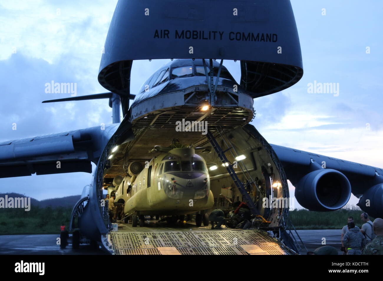 Helicopter inside military transport helicopter Stock Photo - Alamy