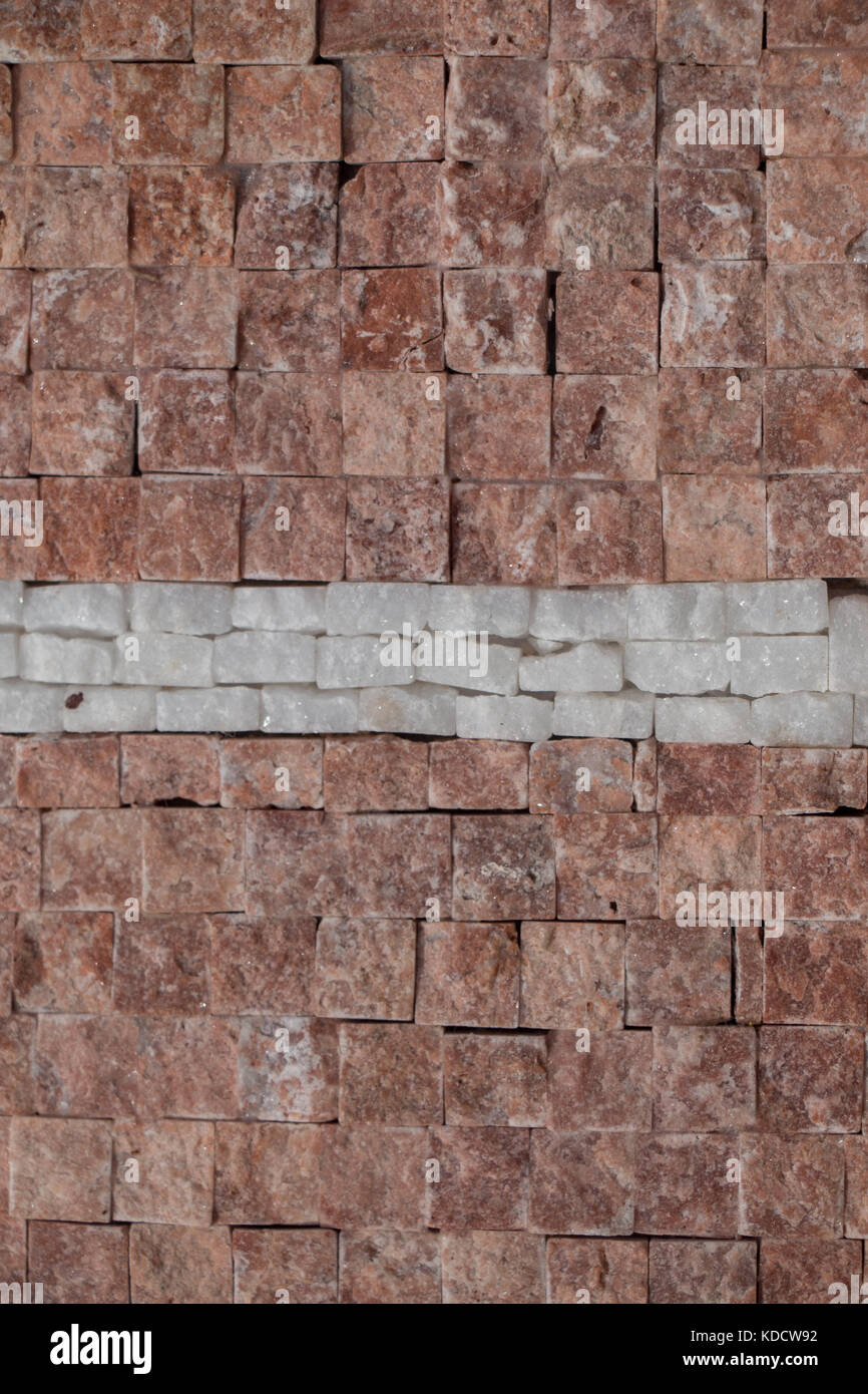 Decorative cubic stone wall as background texture Stock Photo - Alamy
