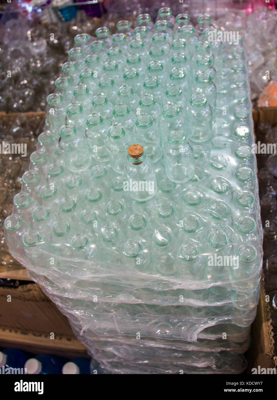 Set of Empty small transparent bottles in a box Stock Photo - Alamy