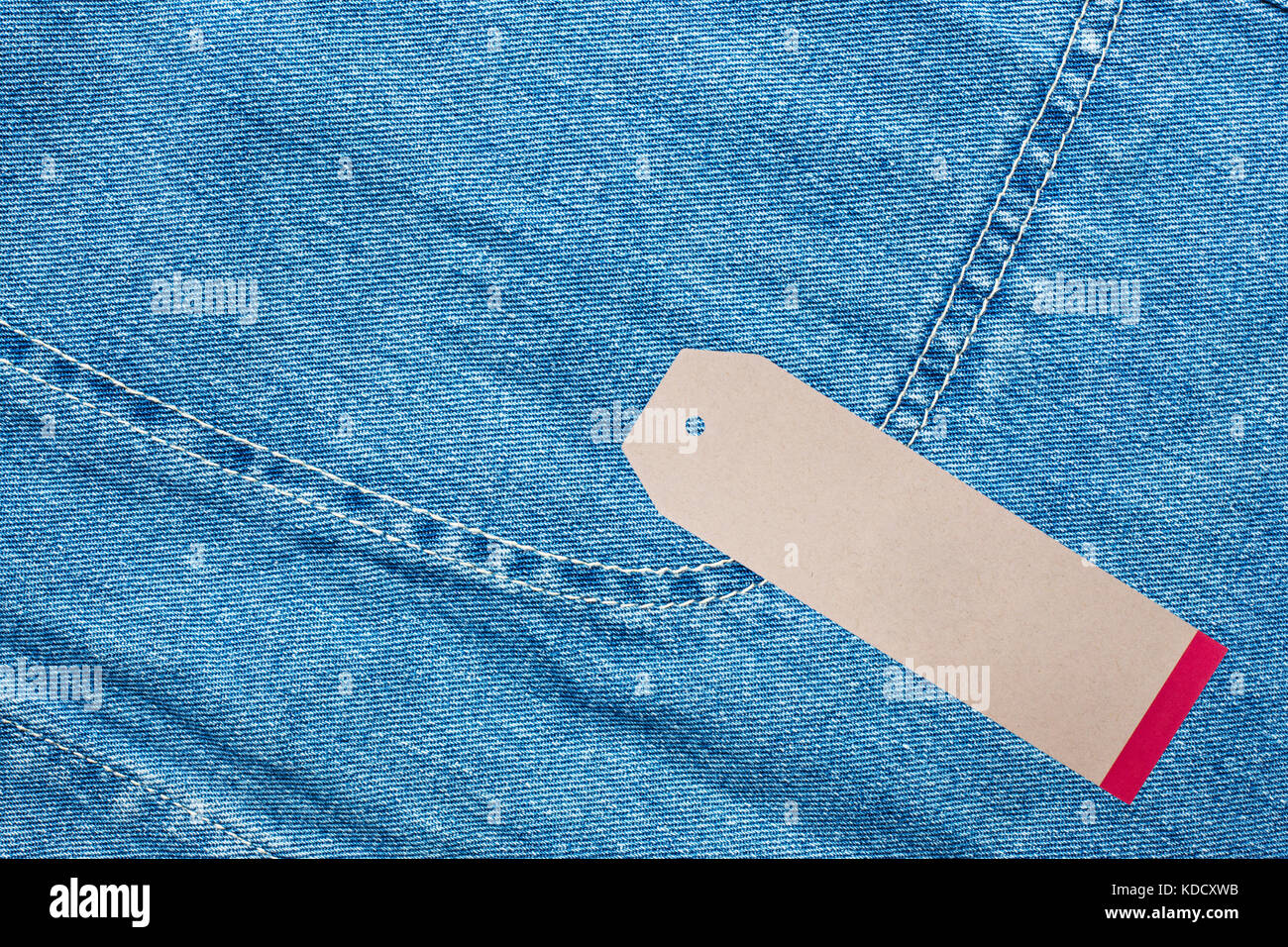 Denim jeans background with seam of jeans fashion design and tag Stock ...