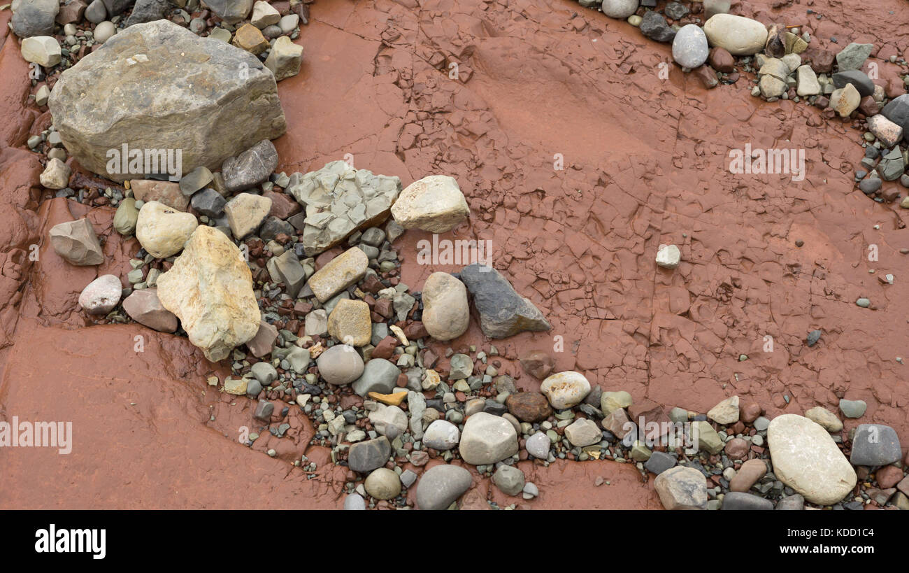 Pebbles and mudstone on beach, Penarth, Wales, UK Stock Photo - Alamy