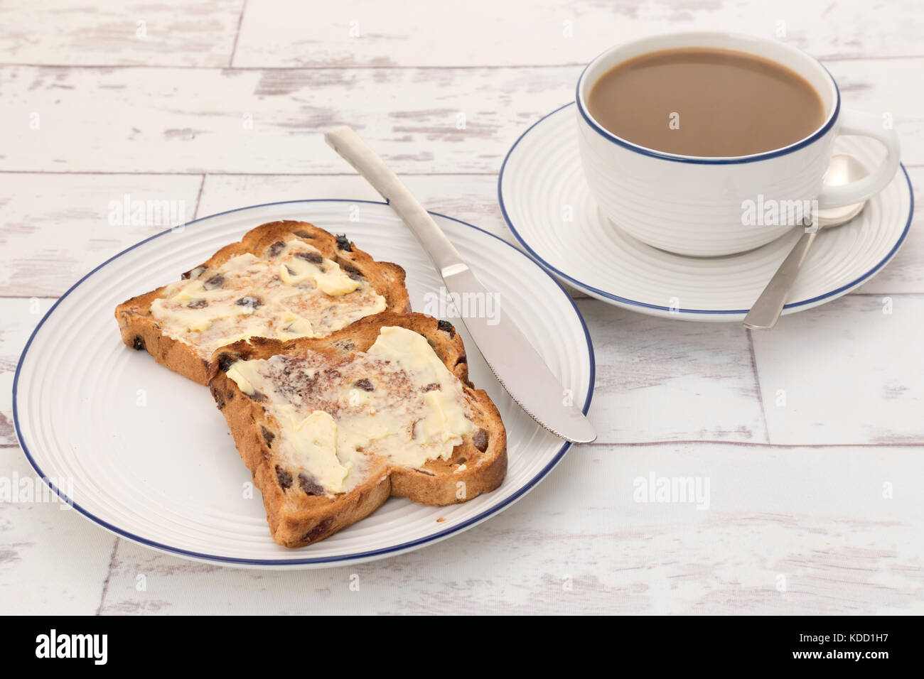 Toasted raisin bread and a coffee Stock Photo - Alamy