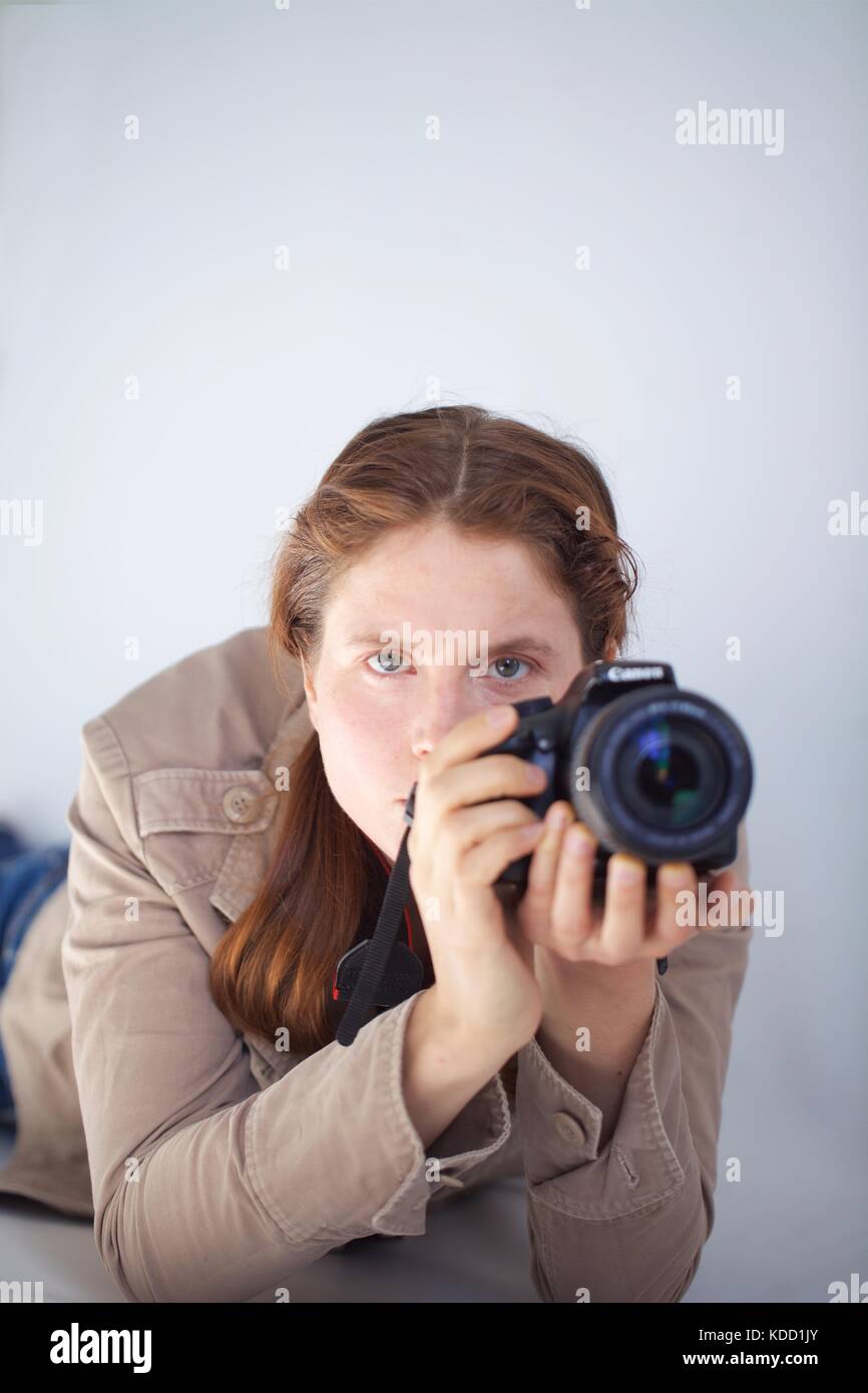 A photographer lays on the floor hi-res stock photography and images ...