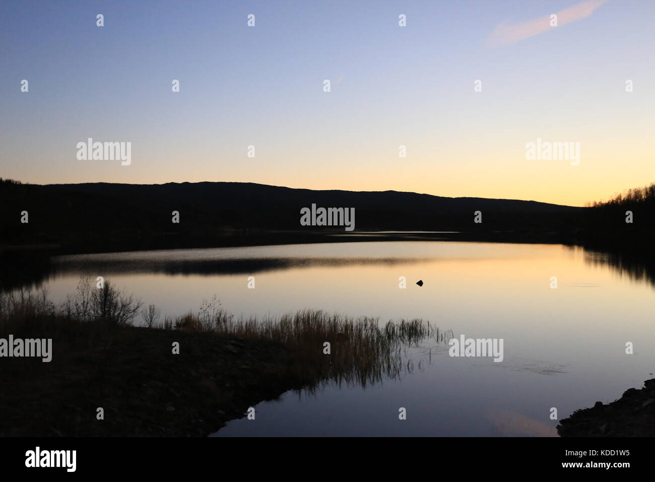 Sunset Over Lake Stock Photo - Alamy