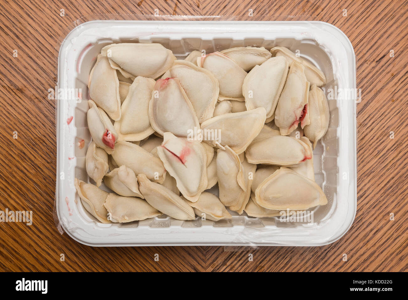 Popular Ukrainian food - Cherry pirogi, frozen Stock Photo - Alamy