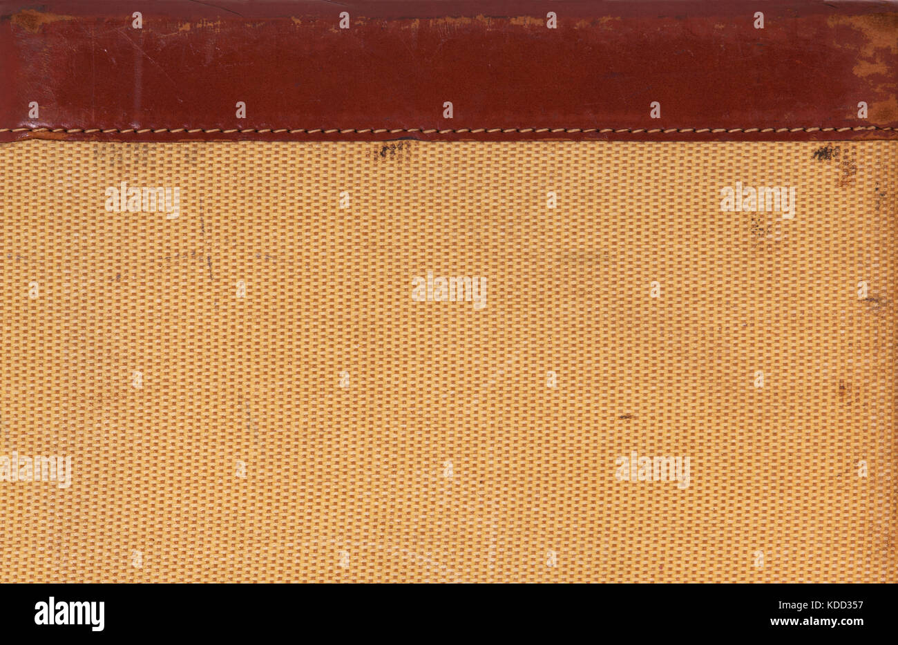 Detail of leather and a woven texture from an old suitcase for a ...