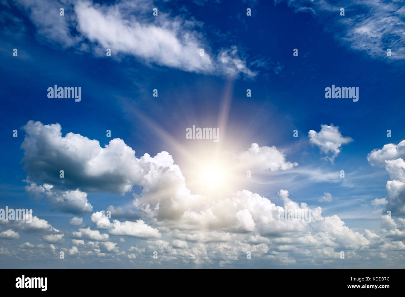 sun on beautiful blue sky Stock Photo - Alamy