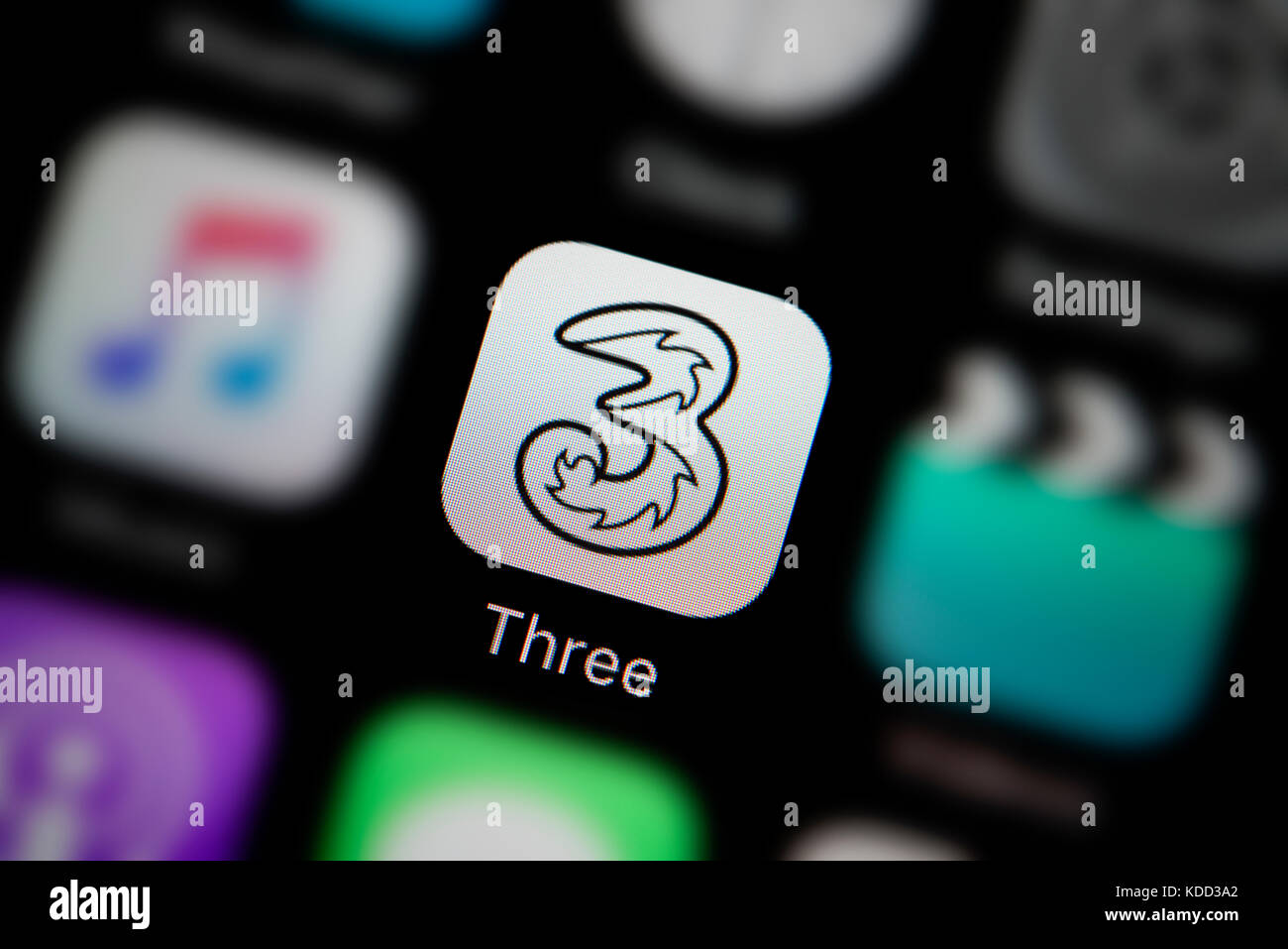 A close-up shot of the logo representing Three app icon, as seen on the ...