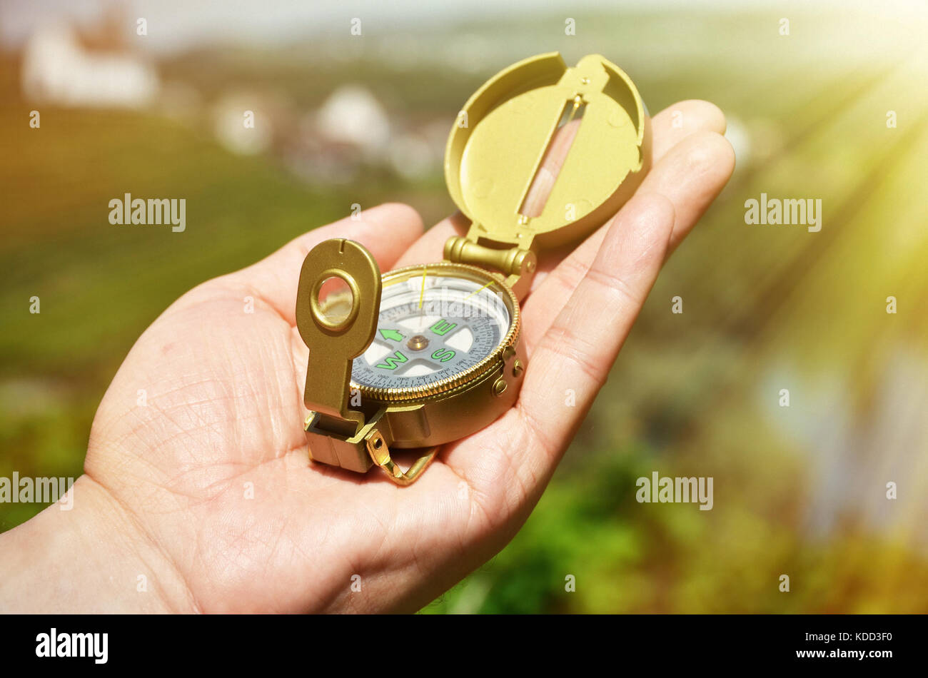Compass in the hand Stock Photo - Alamy