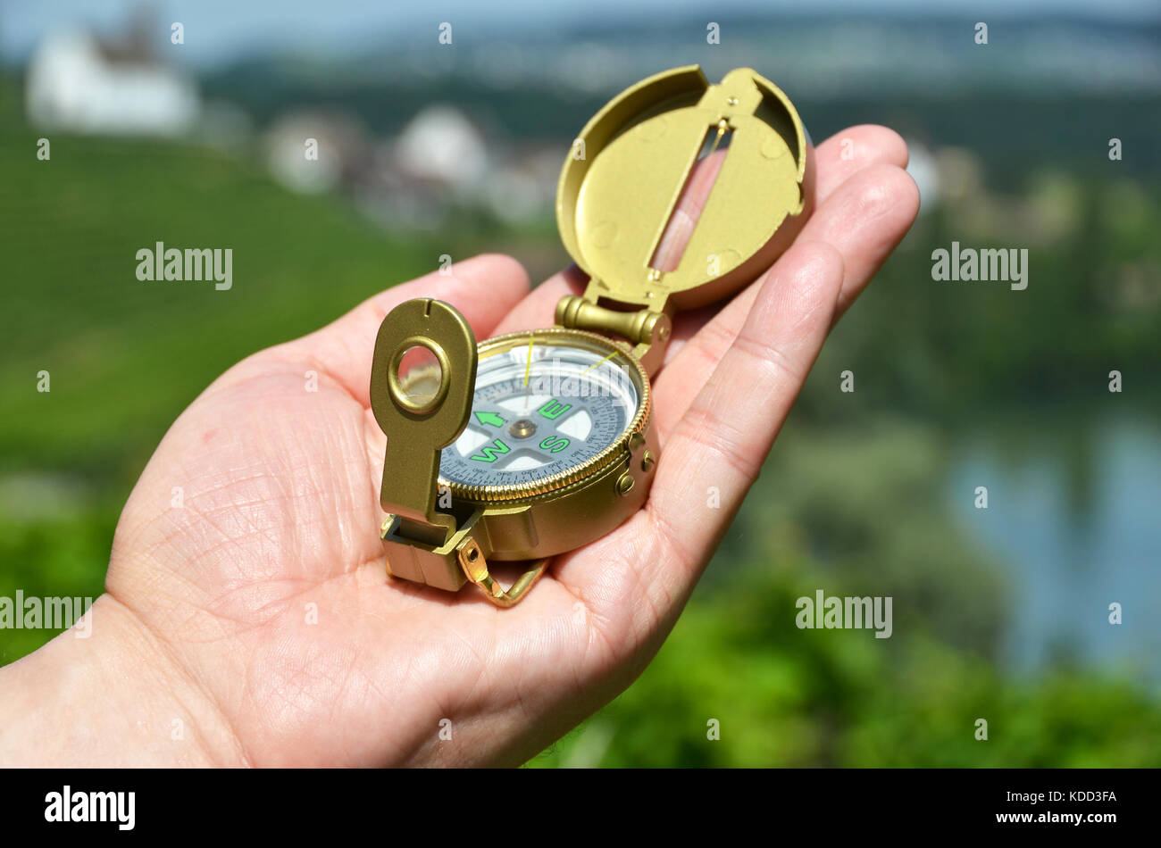 Compass in the hand Stock Photo - Alamy