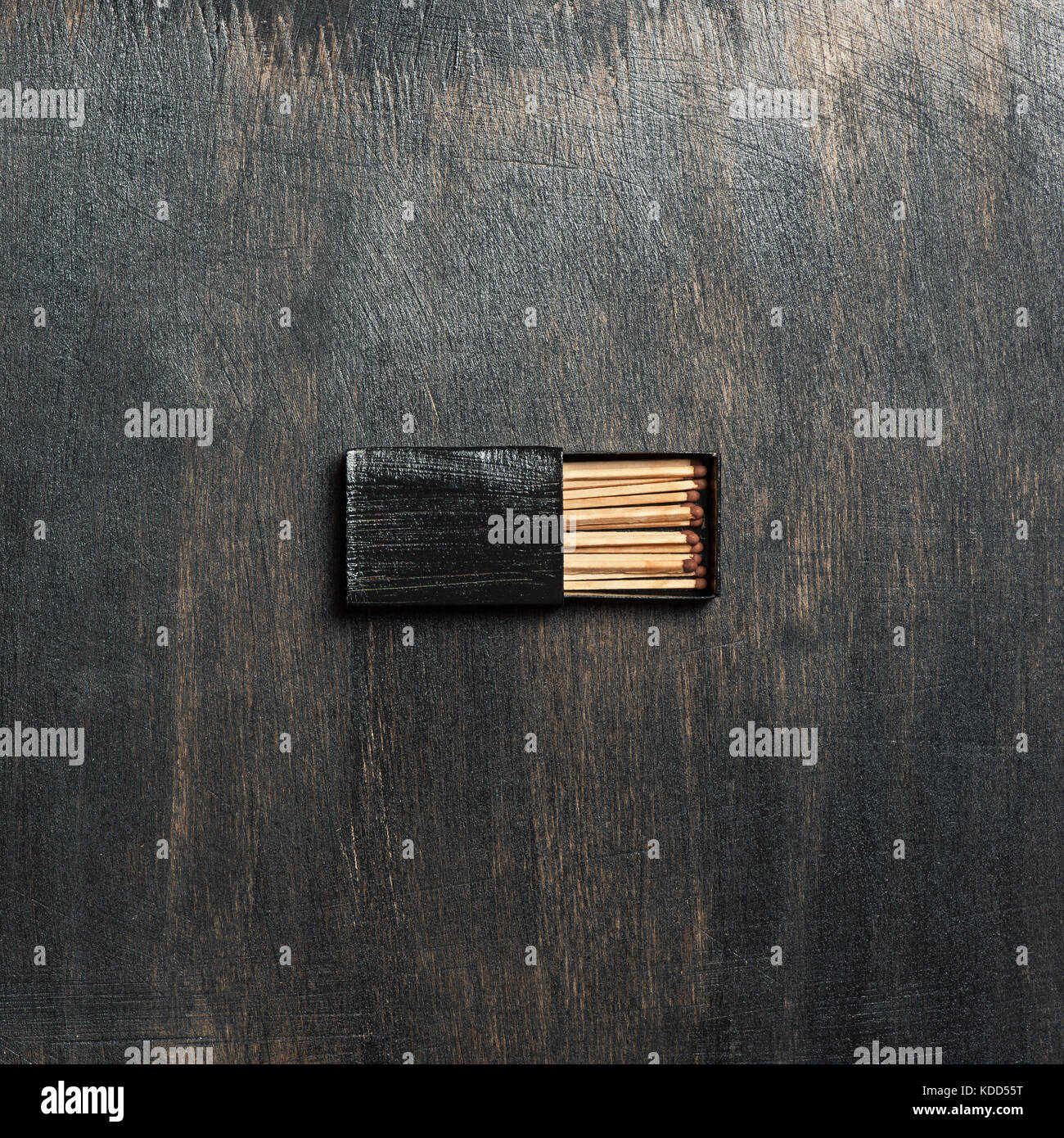 Open black matchbox on the table Stock Photo - Alamy