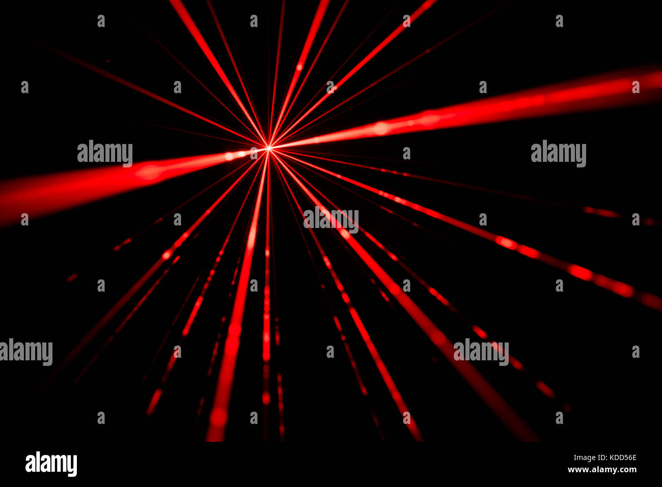 Red laser beams light effect on black background photo Stock Photo - Alamy