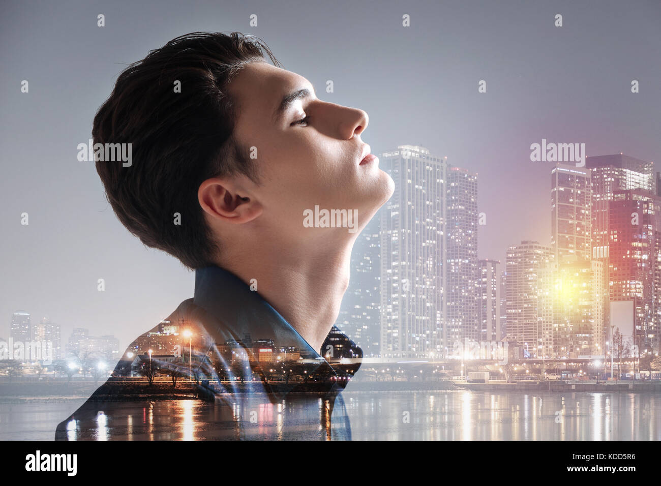 Profile of talented model against city background Stock Photo - Alamy