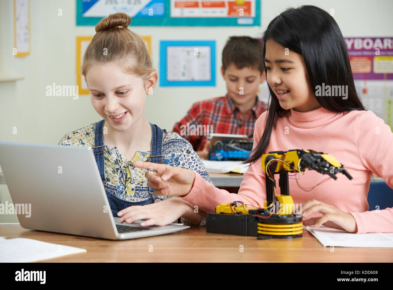 Female Pupils In Science Lesson Studying Robotics Stock Photo - Alamy