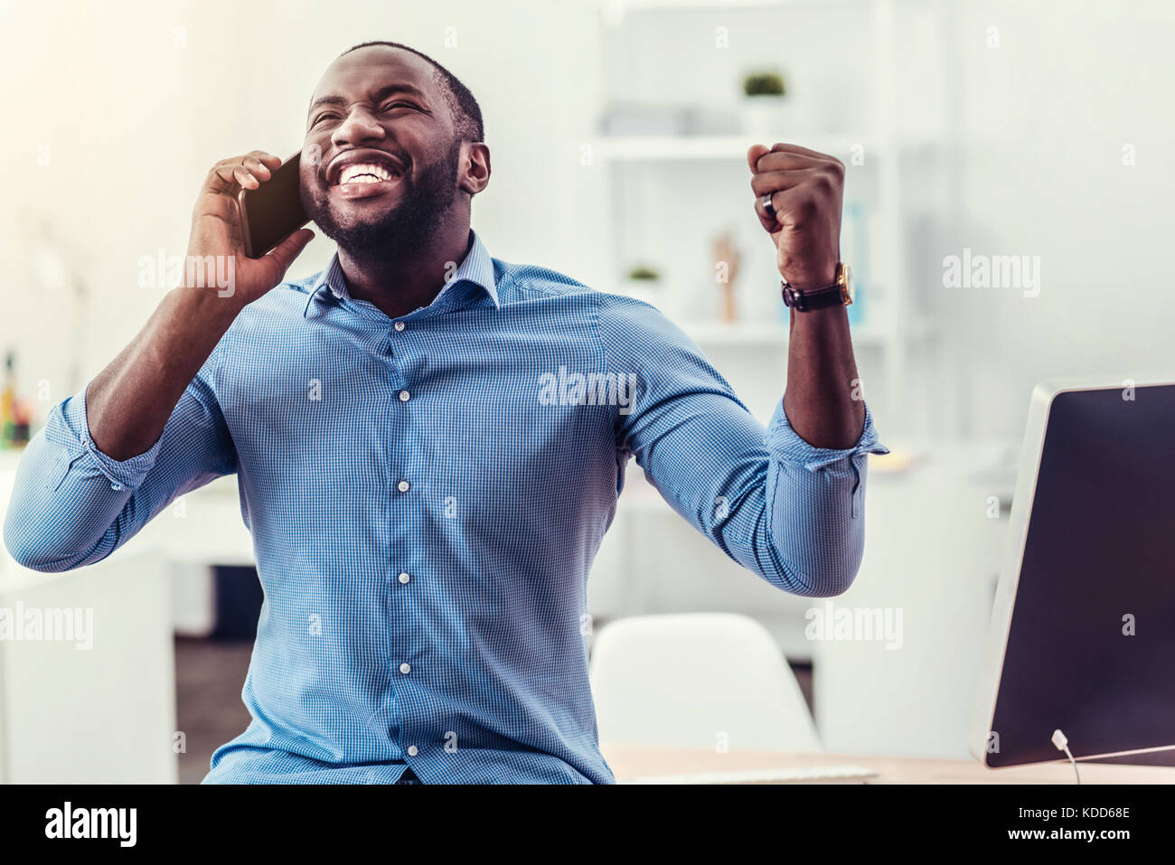 Excited african guy talking hi-res stock photography and images - Alamy