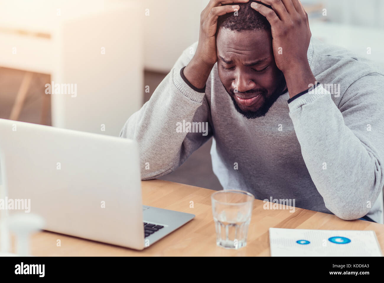 Man Crying At Computer