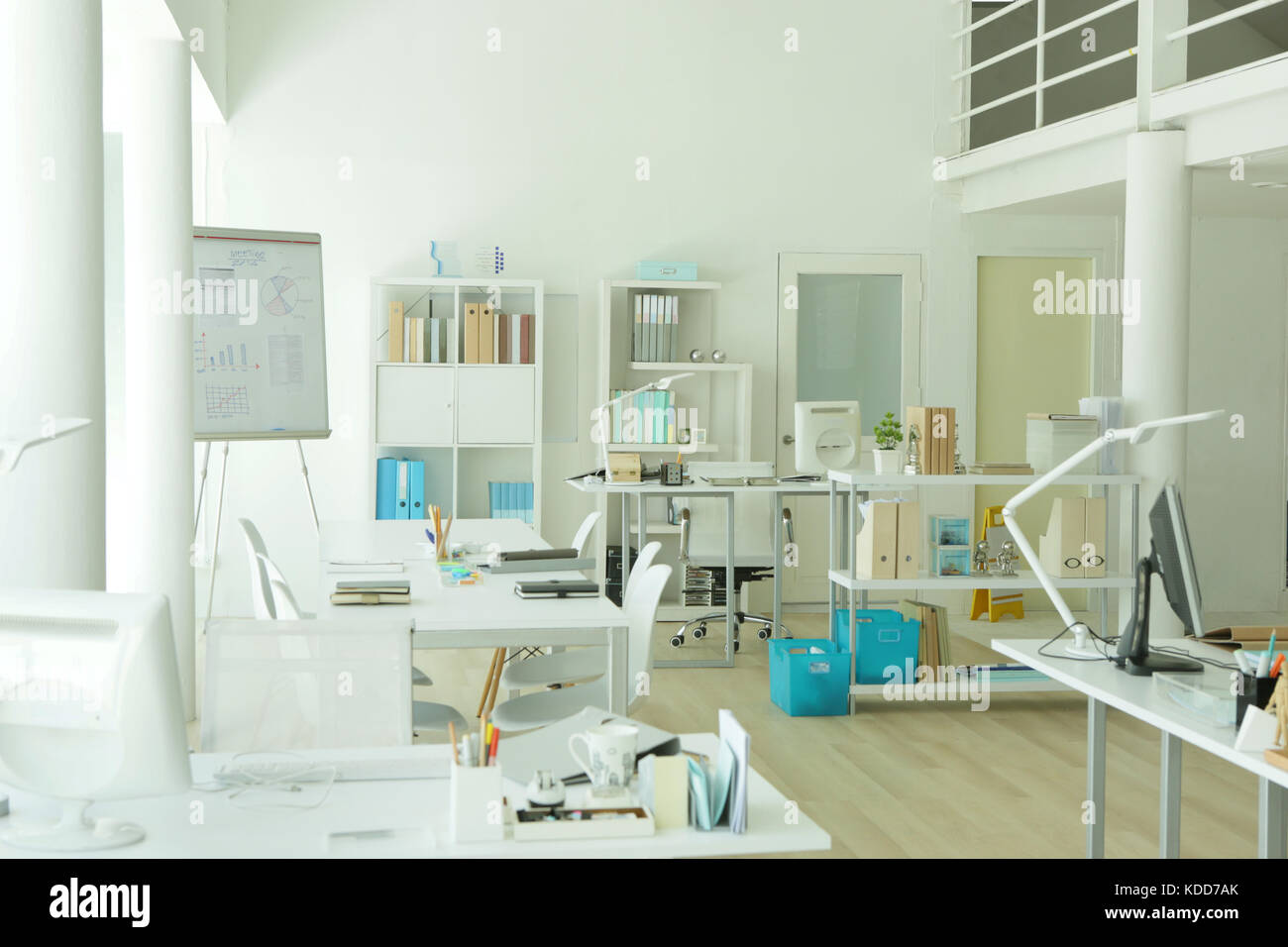 white loft office with three work stations and a meeting conner Stock ...