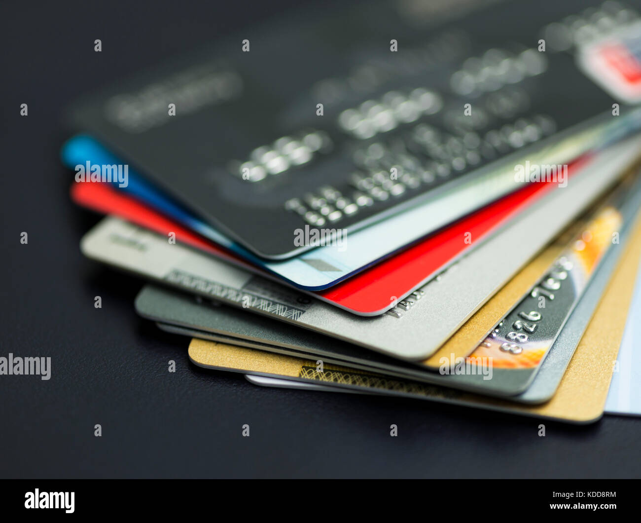 Stack of multicolored credit cards close-up Stock Photo - Alamy