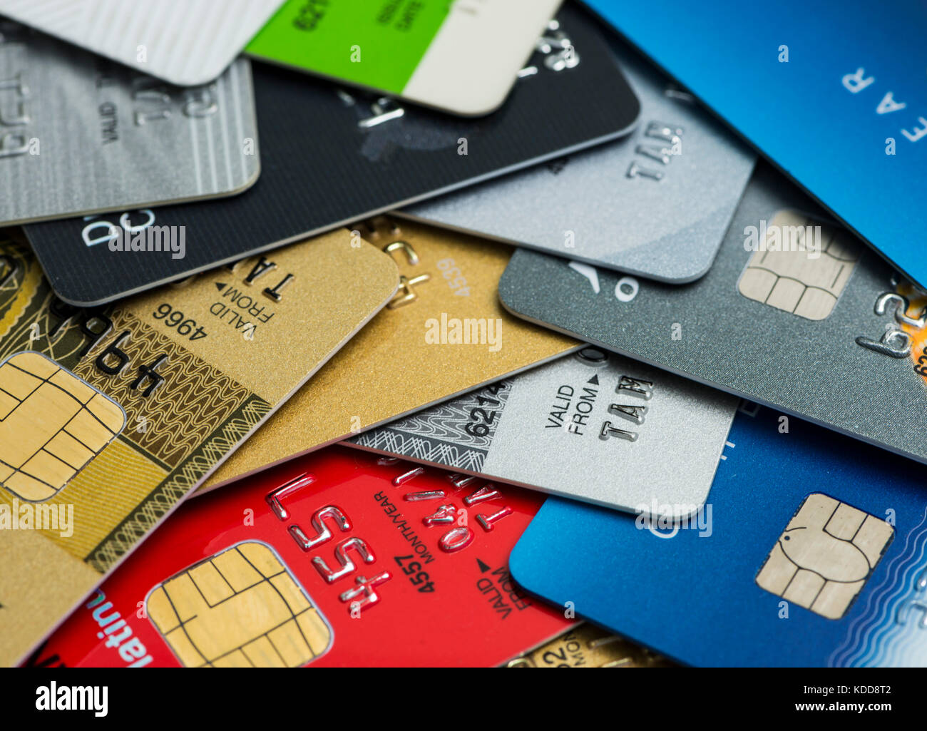 Stack of multicolored credit cards close-up Stock Photo - Alamy
